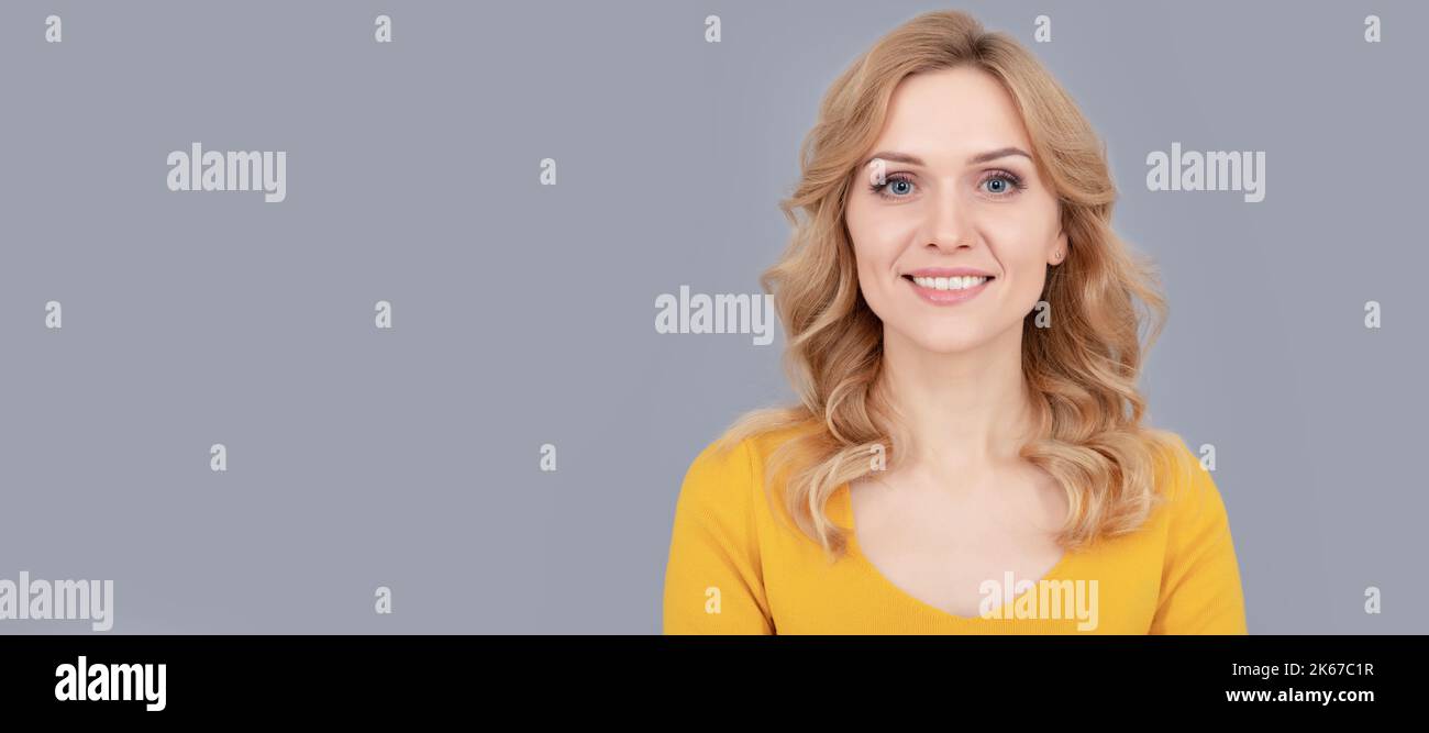 Woman isolated face portrait, banner with mock up copy space. nice smile. smooth face skin ...