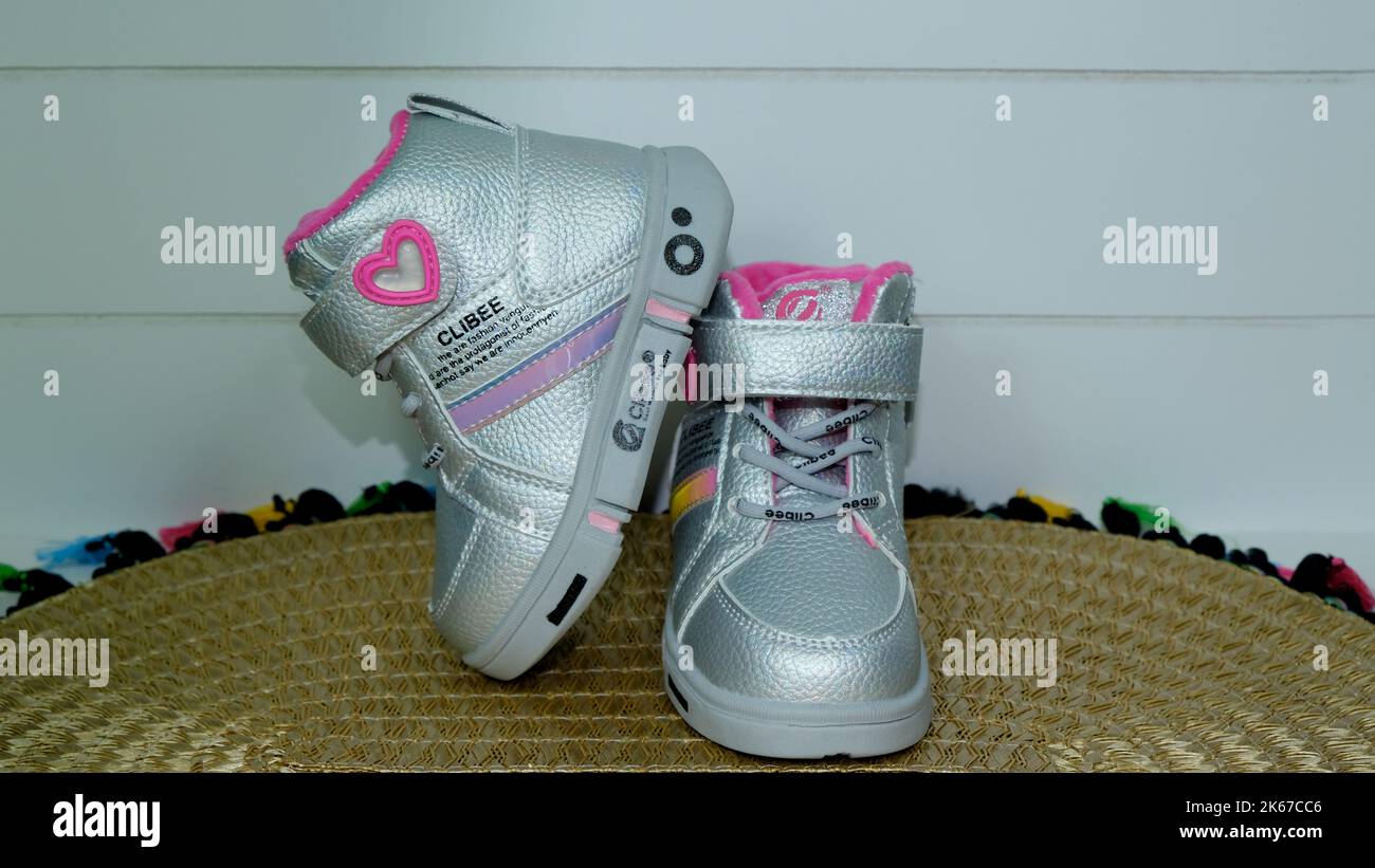 Baby boots with silver color Stock Photo - Alamy