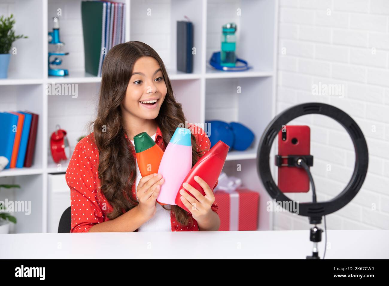 Teenager child recording video tutorial for social media with smart ...