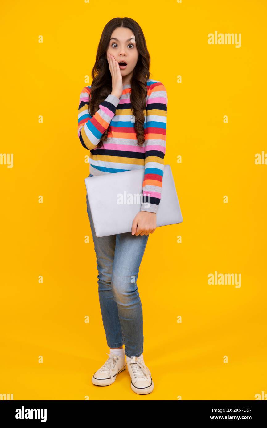 Student teenager schoolgirl with laptop on isolated background. Online ...