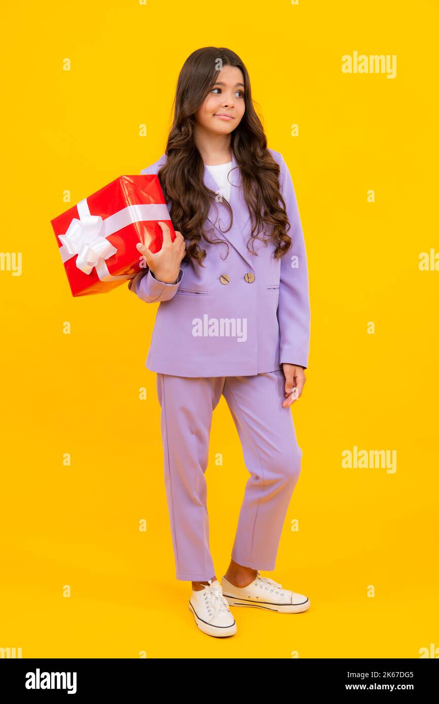 Teenager kid with present box. Teen girl giving birthday gift. Present ...