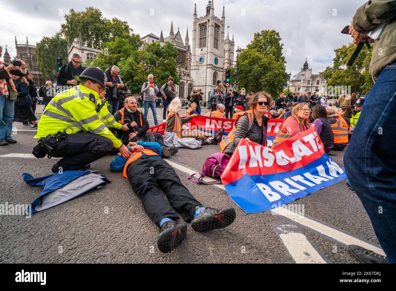 London UK. 12 October 2022 . Insulate Britain activists glue themselves ...