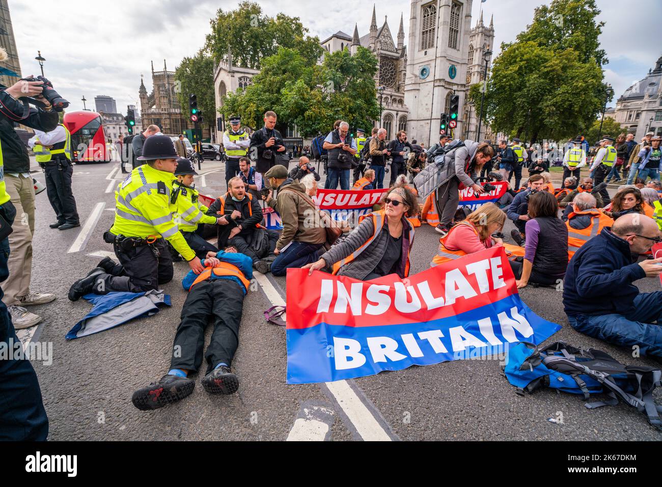 London UK. 12 October 2022 . Insulate Britain activists glue themselves ...