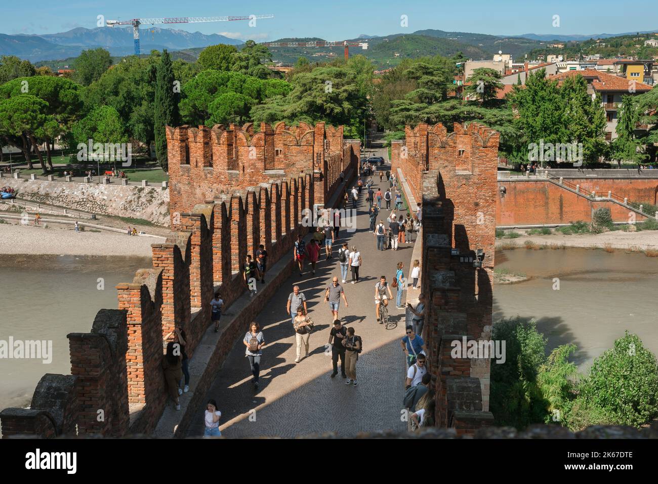Ponte Scaligero Verona, view in summer of people walking across the ...