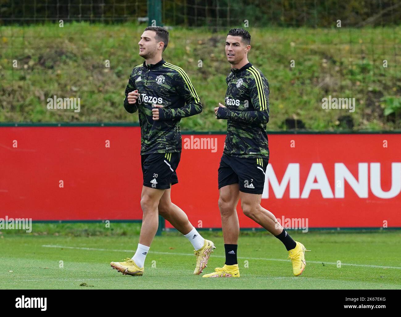 Manchester United's Diogo Dalot (left) and Cristiano Ronaldo during a ...