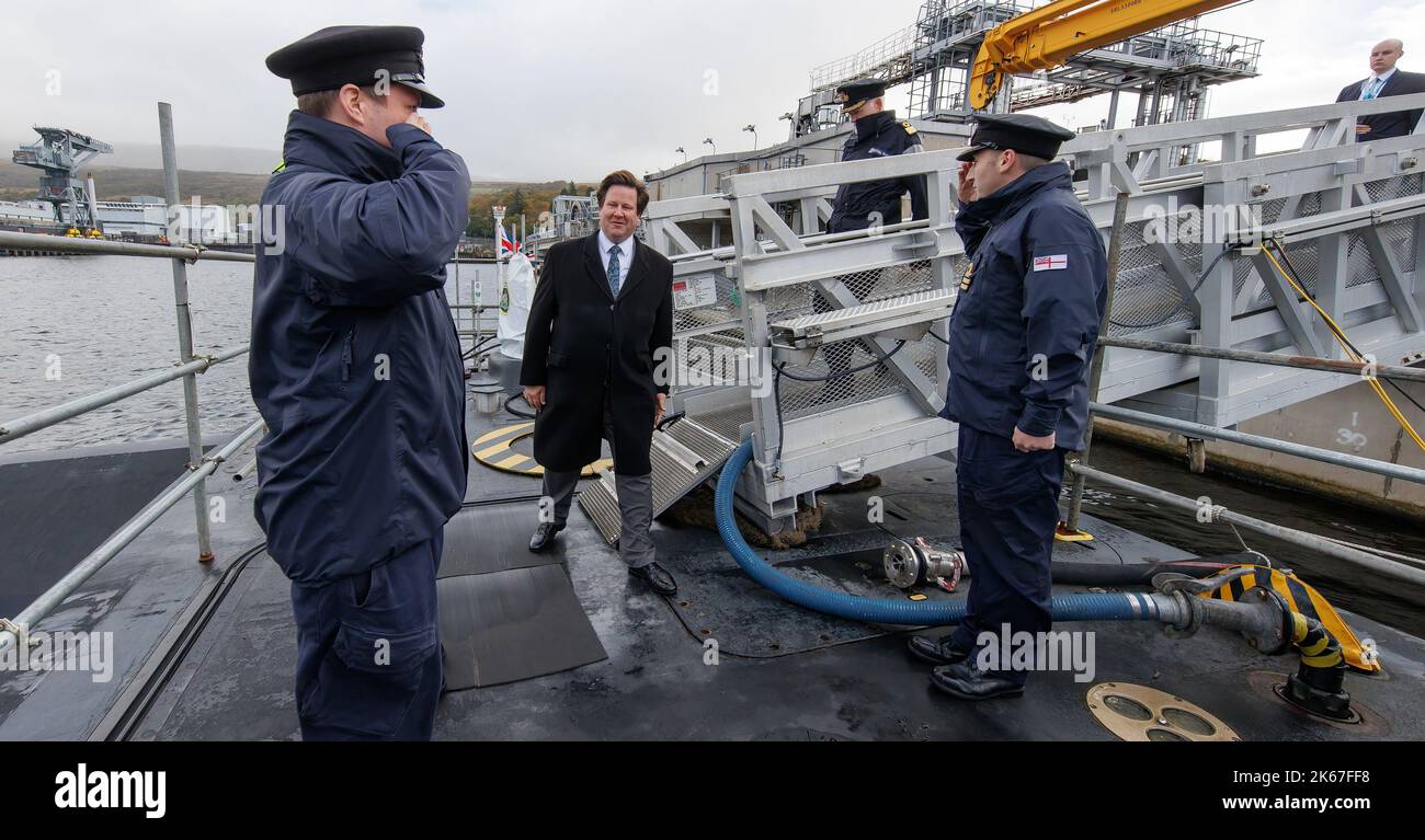 Defence Procurement minister Alec Shelbrooke is saluted as he boards ...