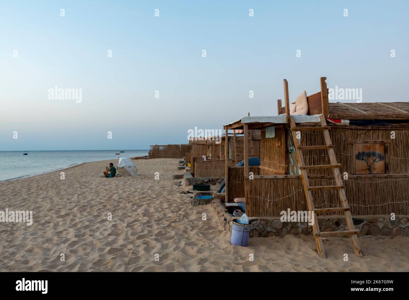 Traditional Bedouin style Hoosha huts for accommodation made of Bamboo and palm leaves in a ...