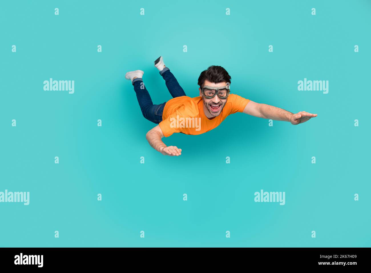 Full length photo of carefree sporty guy trying skydive falling down ...