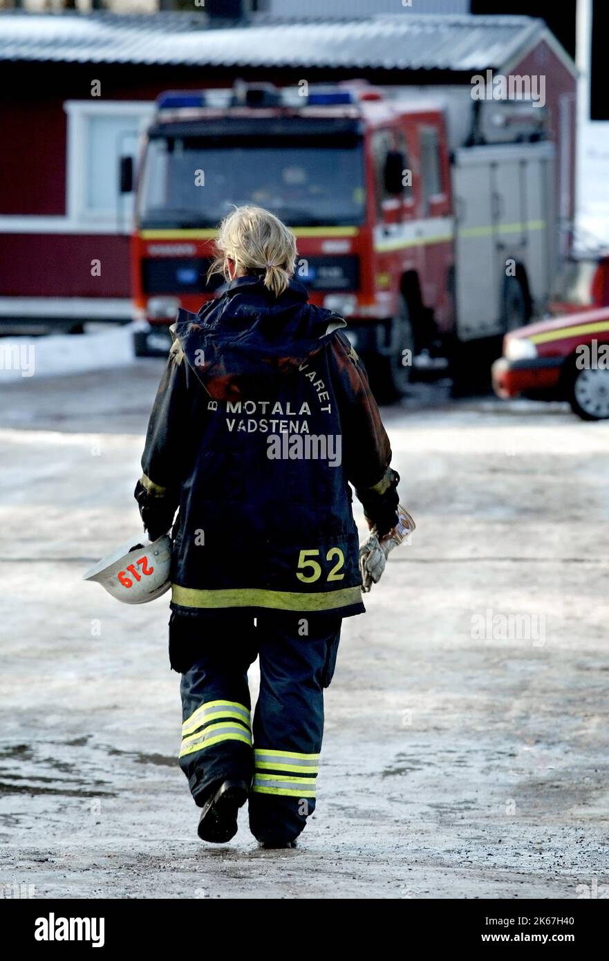 Woman at the rescue service's training area at a fire brigade taking ...
