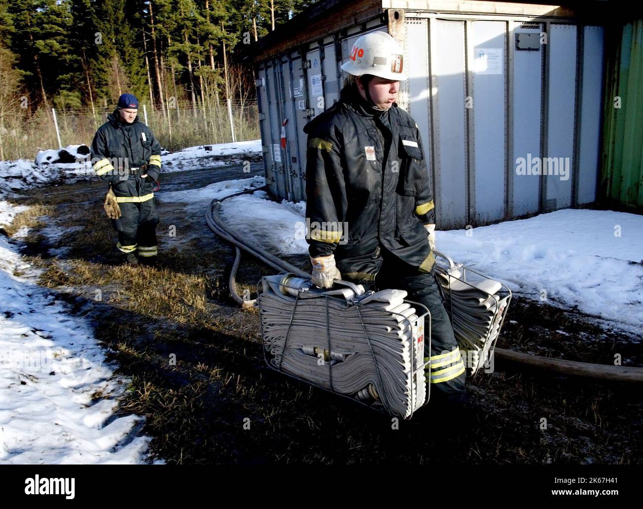 Woman at the rescue service's training area at a fire brigade taking ...