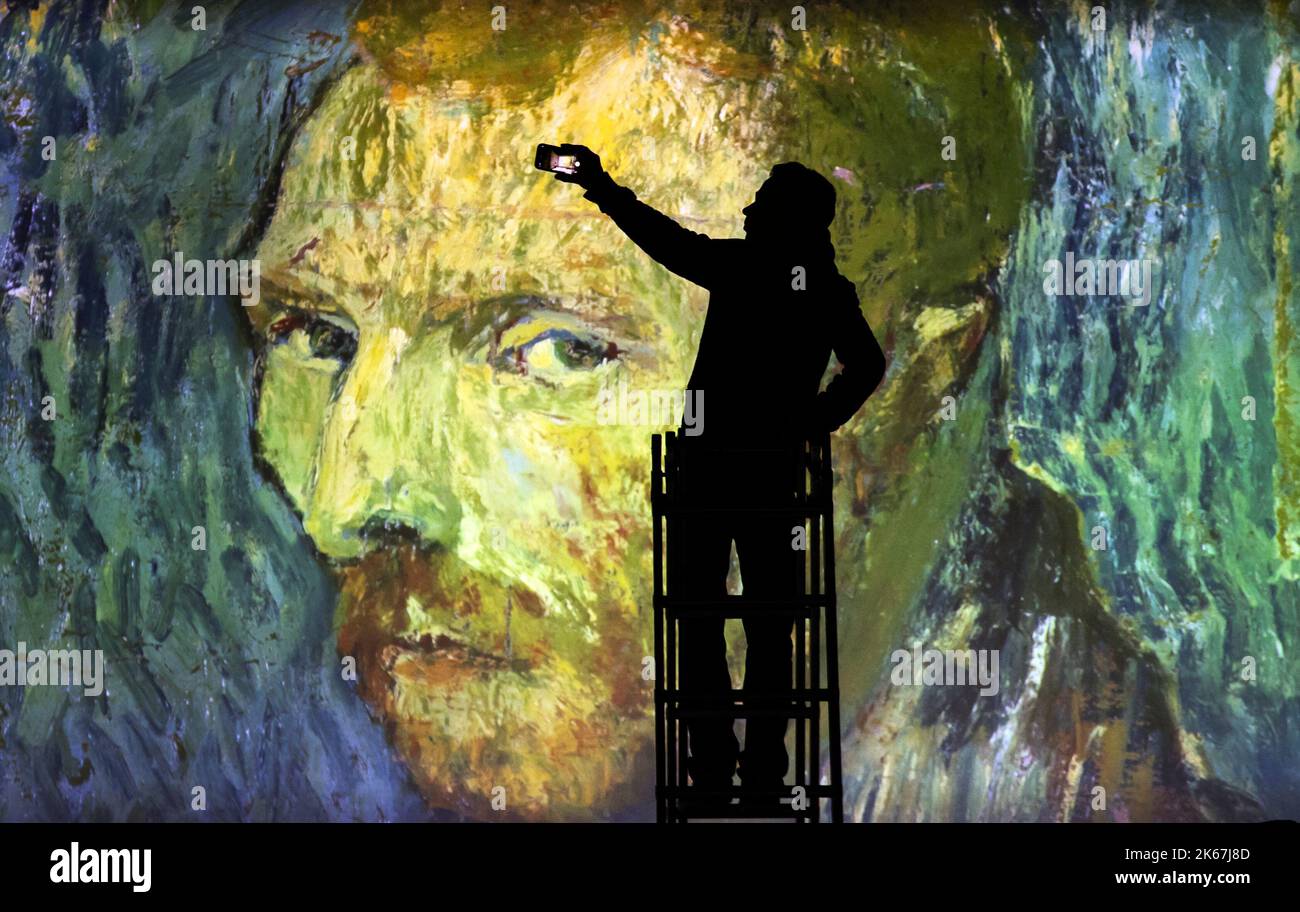 A workman takes a photo has the finishing touches are made ahead of the ...