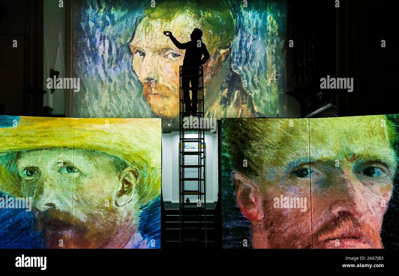 A workman takes a photo has the finishing touches are made ahead of the ...