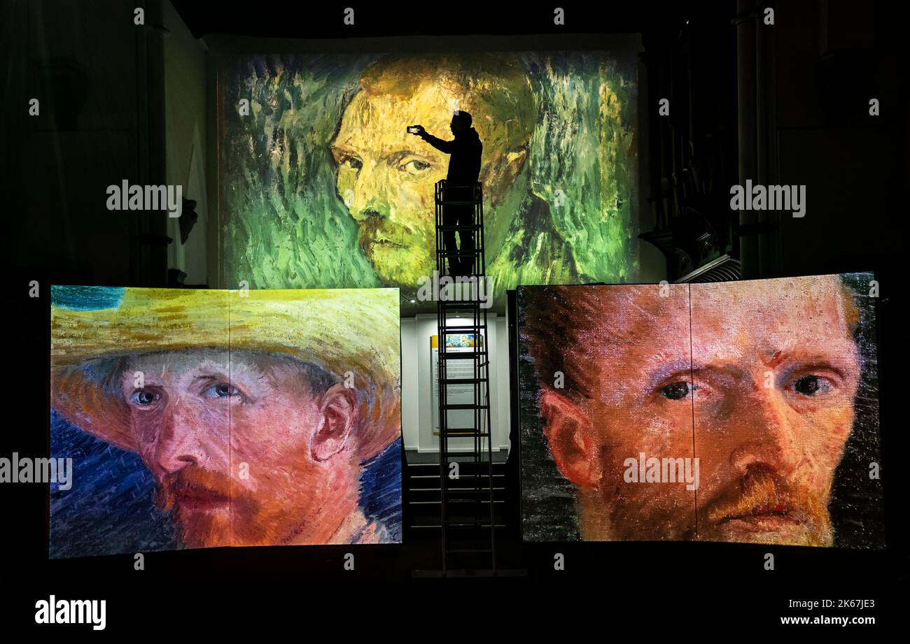 A workman takes a photo has the finishing touches are made ahead of the ...