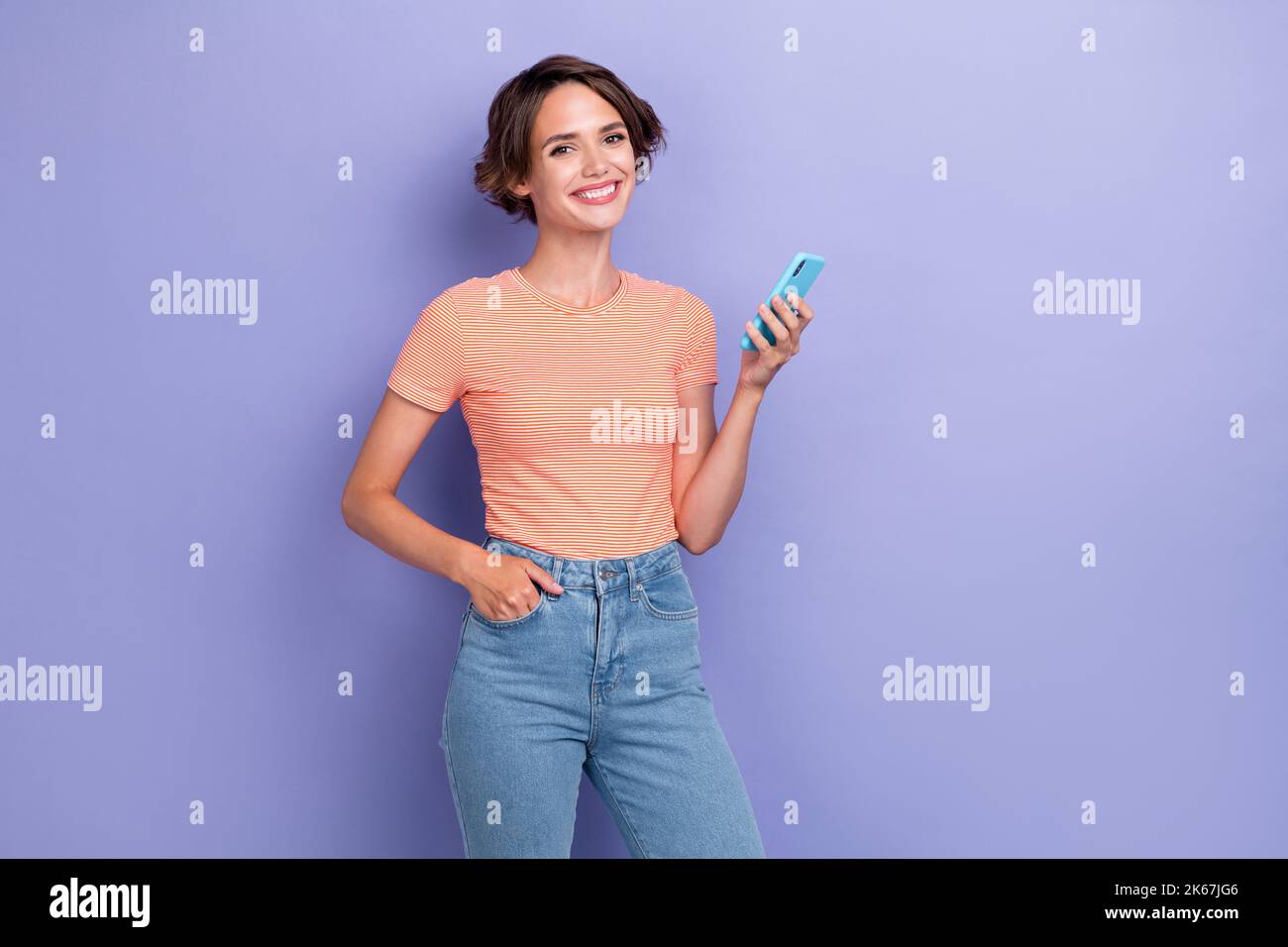 Photo of positive satisfied lady hand hold telephone enjoy new cool ...