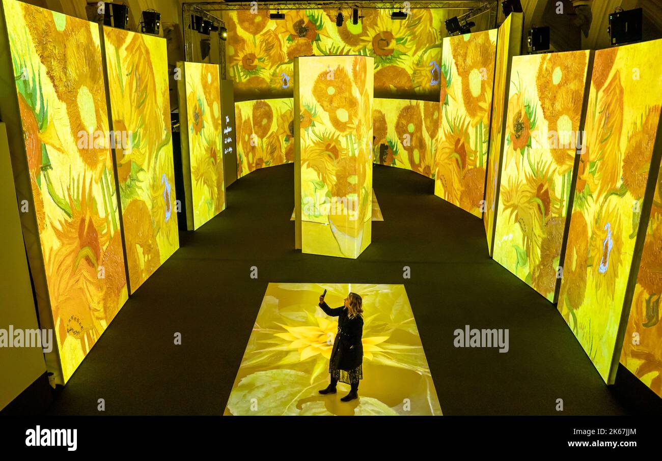 A woman takes a photo has the finishing touches are made ahead of the ...
