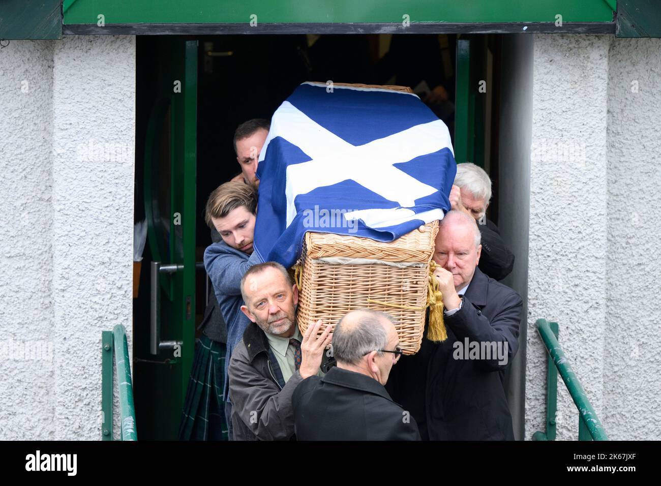 Mourners carrying the coffin of Ian Hamilton KC following his funeral ...