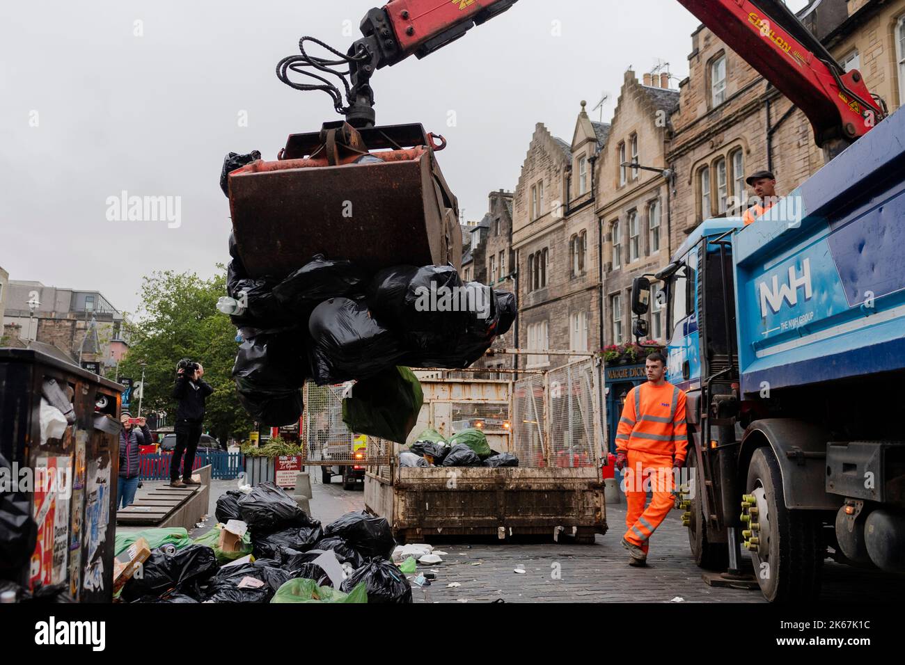 Refuse workers start to clean Edinburgh's Grassmarket after being on ...