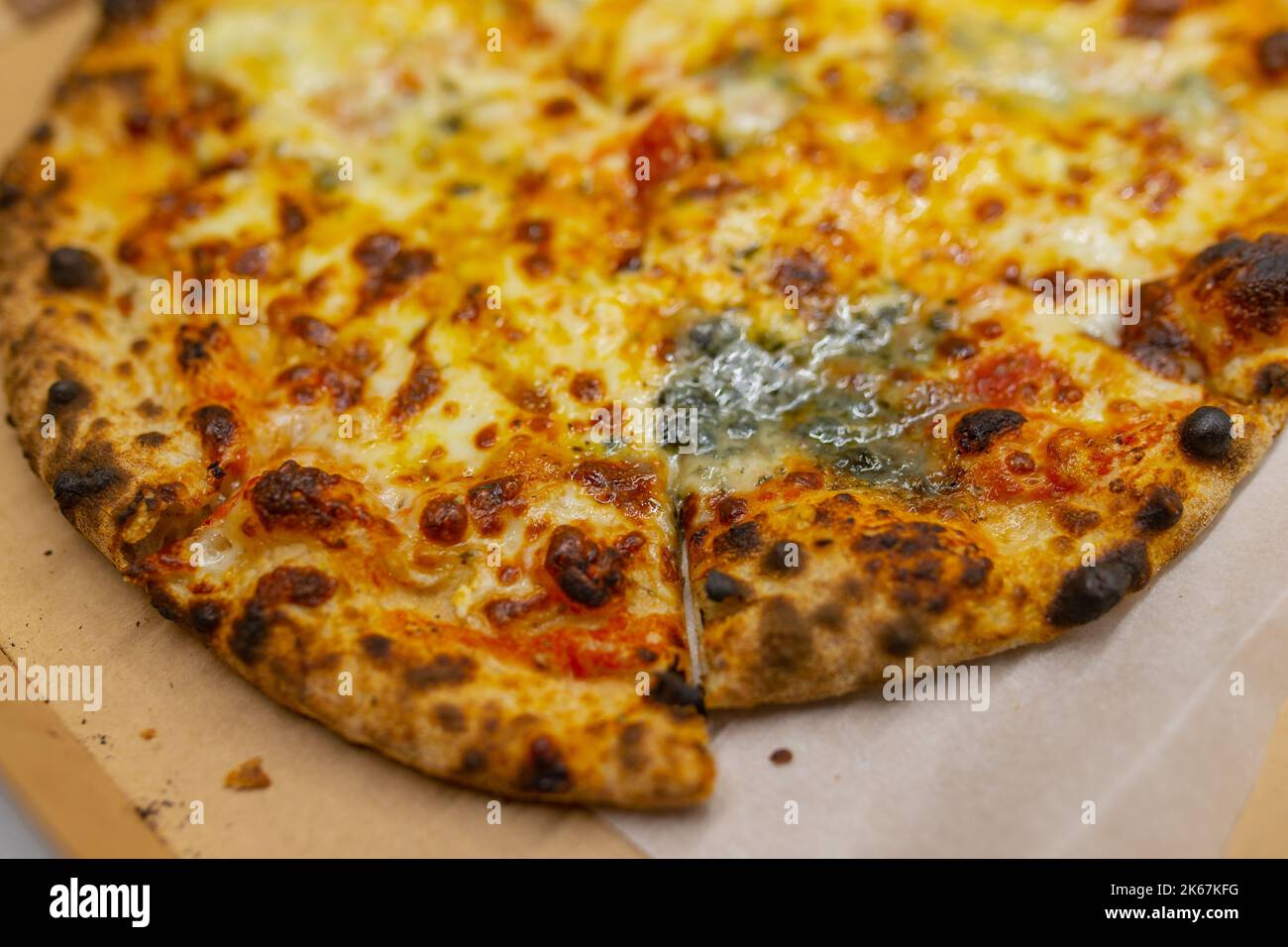 Real italian quattro formaggi cheese pizza Stock Photo - Alamy
