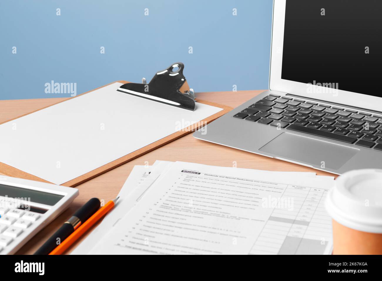 paperwork in the office and laptop on the desktop Stock Photo - Alamy