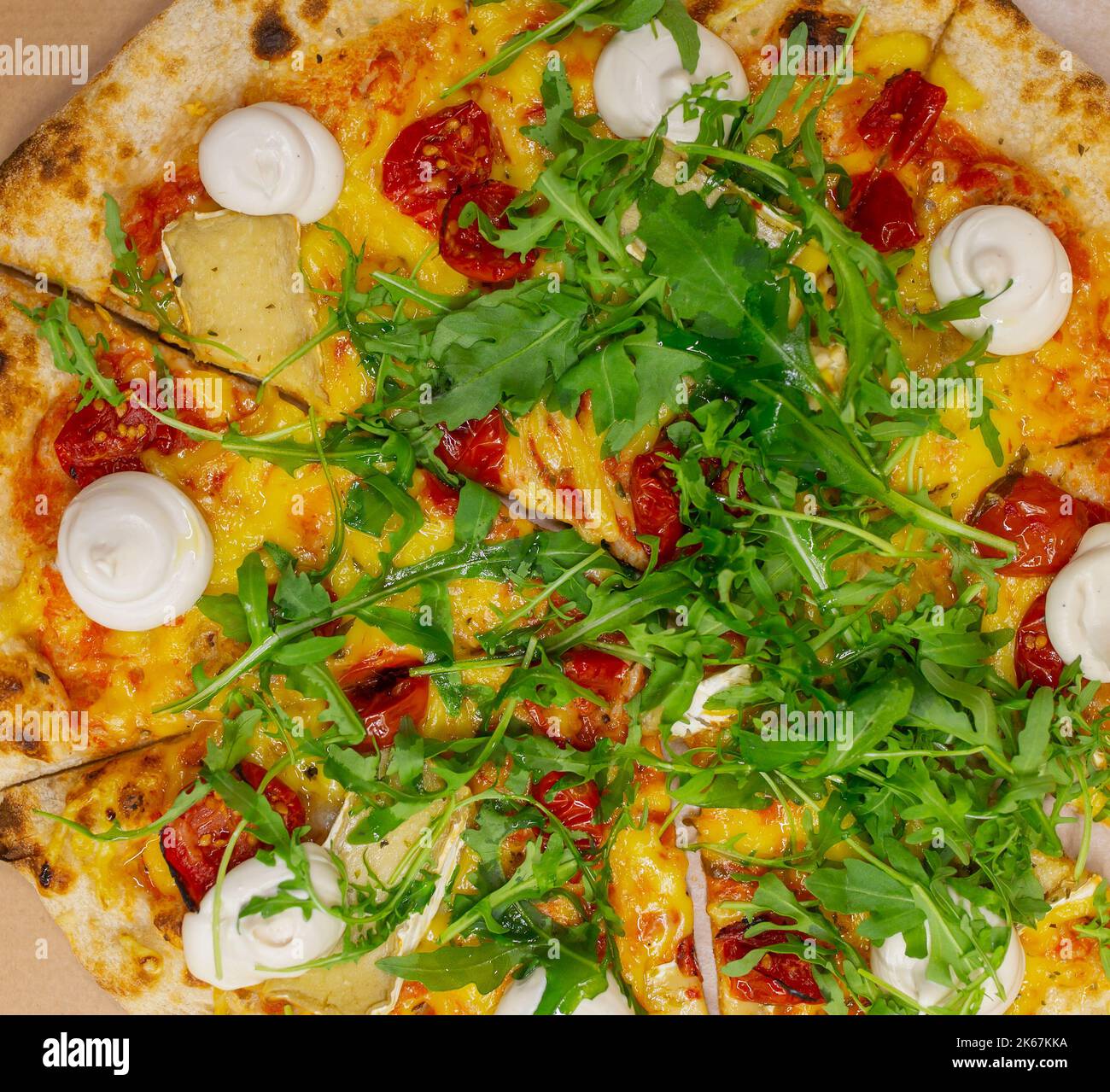 Arugula or rucola several type cheese italian pizza Stock Photo - Alamy