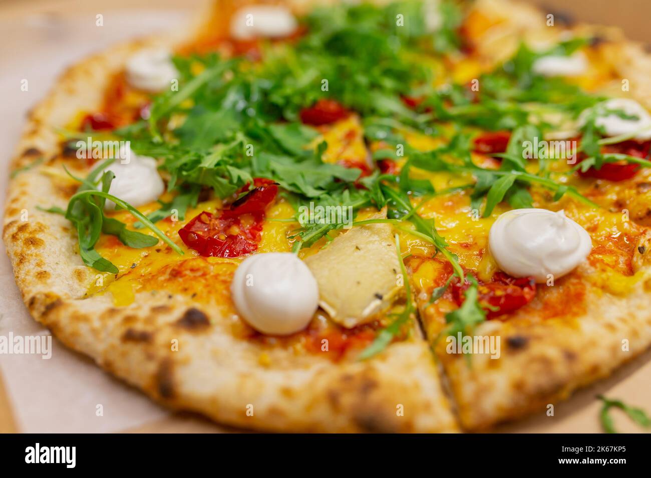 Arugula or rucola several type cheese italian pizza Stock Photo - Alamy
