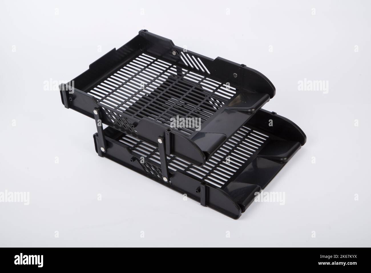 A closeup of black horizontal tray for A4 papers isolated on white ...