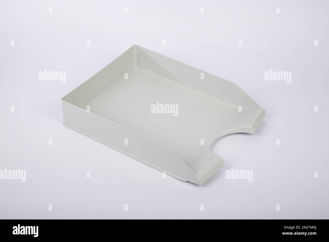 A closeup of white horizontal tray for A4 papers isolated on white ...