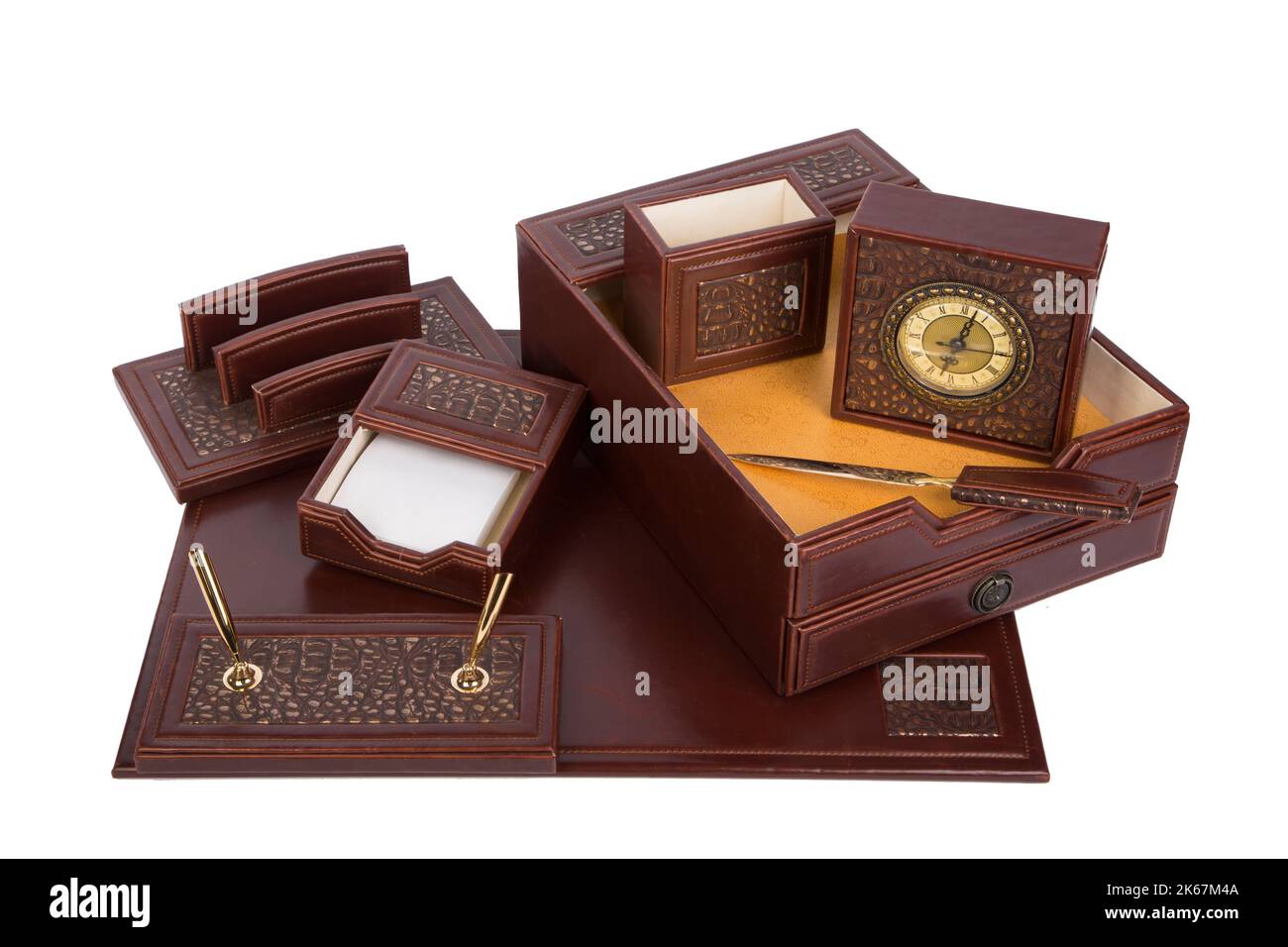 A closeup of a classic office table set isolated on white background ...