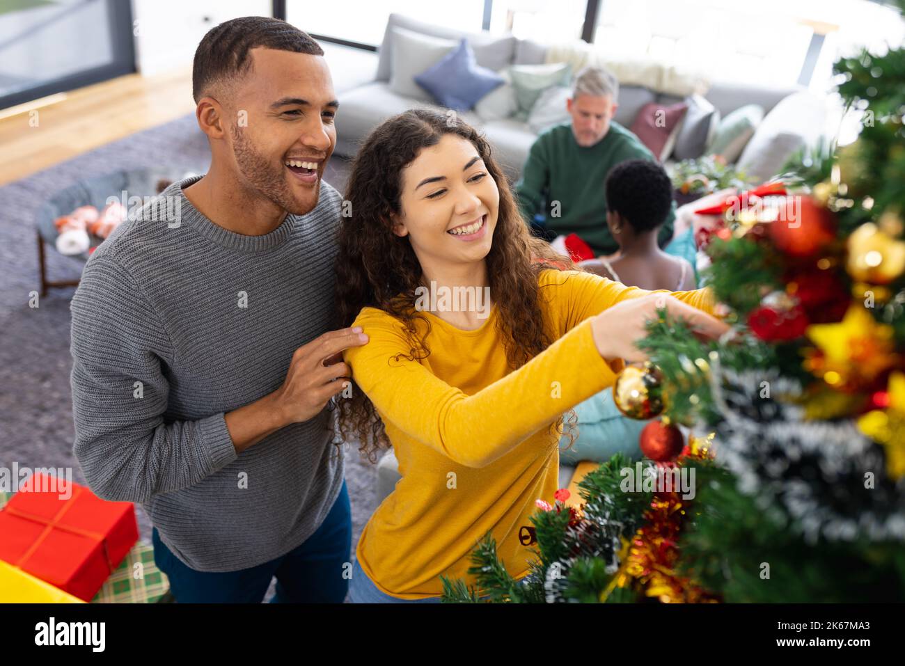 Celebrating home couple hi-res stock photography and images - Alamy