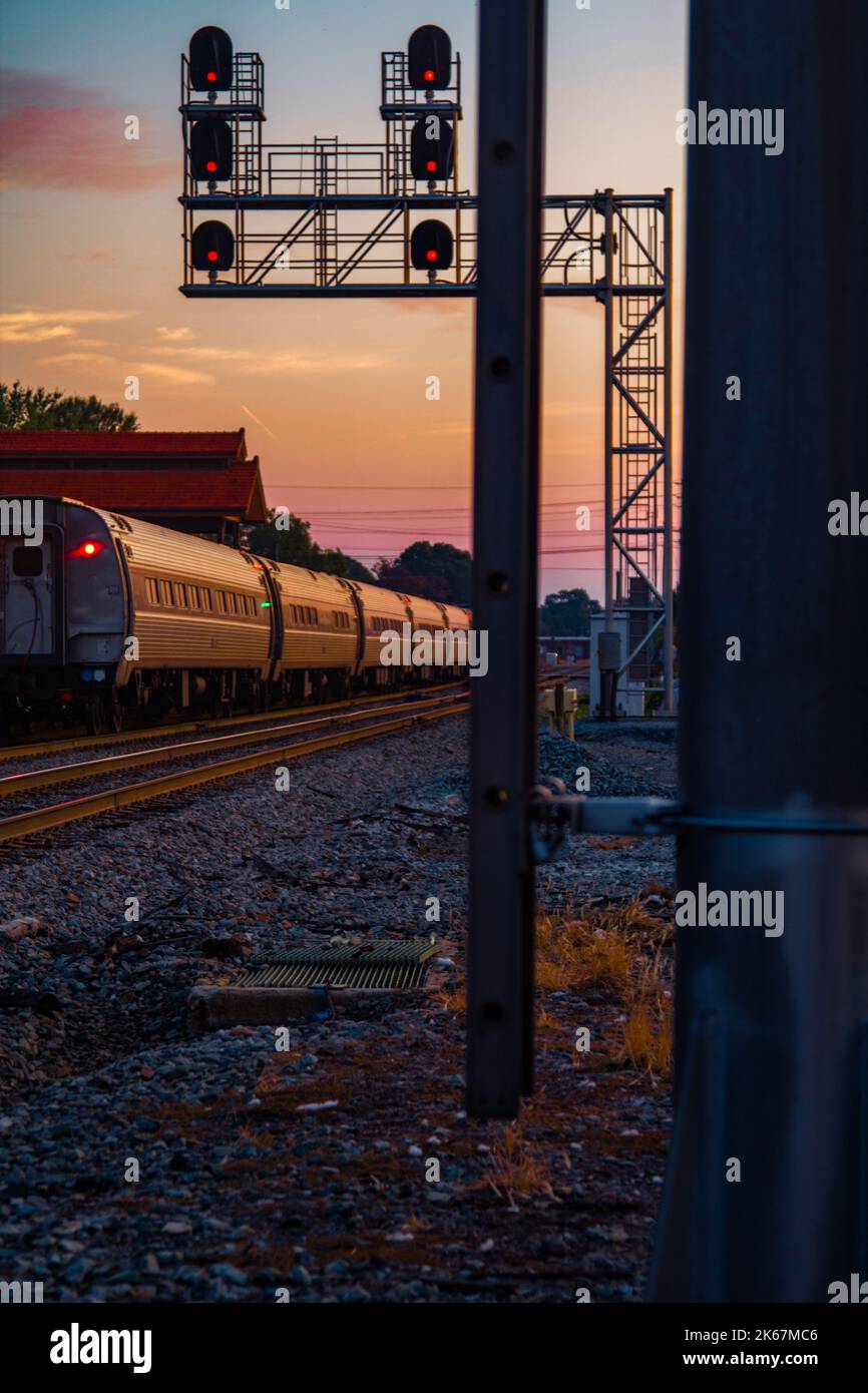 Passenger Train Entering Station Stock Photo - Alamy