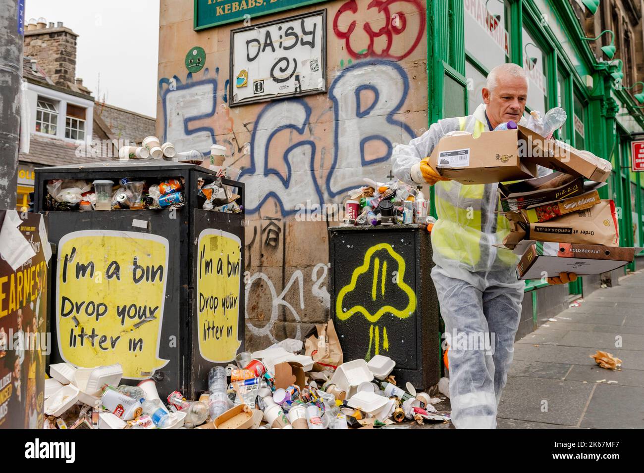 Refuse workers start to clean at Edinburgh's George IV Bridge after ...