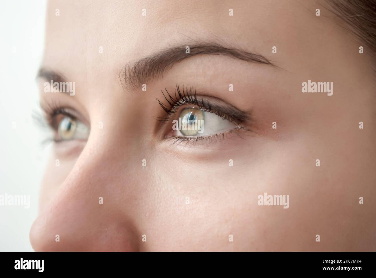 Female eye close-up, look into left Stock Photo - Alamy