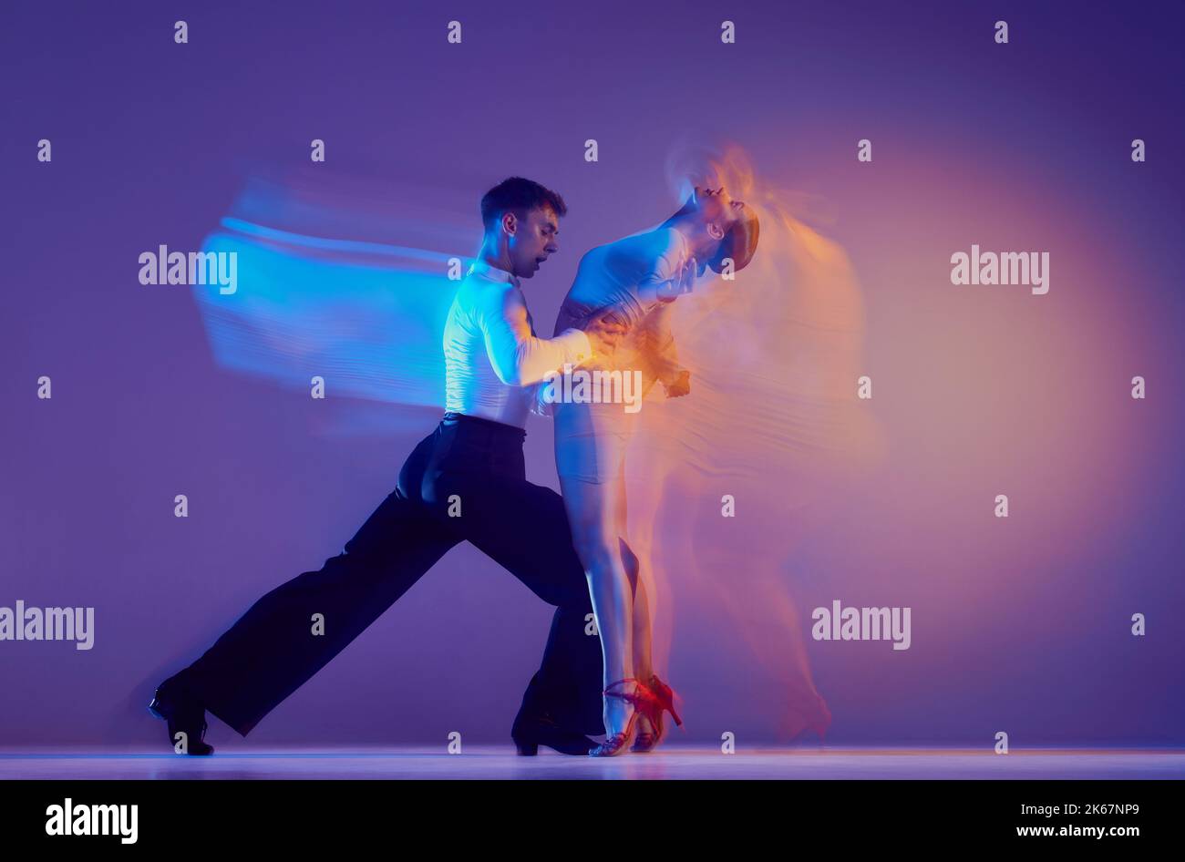Art in motion. Flexible adorable ballroom dancers in stage attires ...