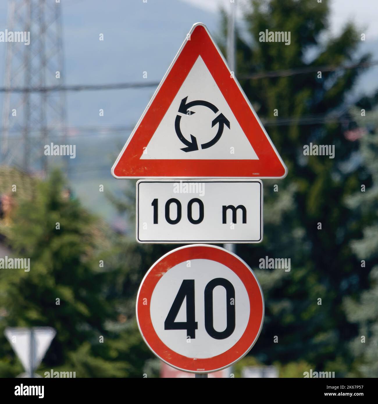 A close-up shot of the priority roundabout sign and the 40-speed limit Stock Photo - Alamy