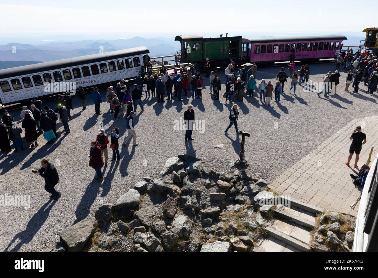 Crowd of passengers wait to board trains on the Mount Washington Cog ...