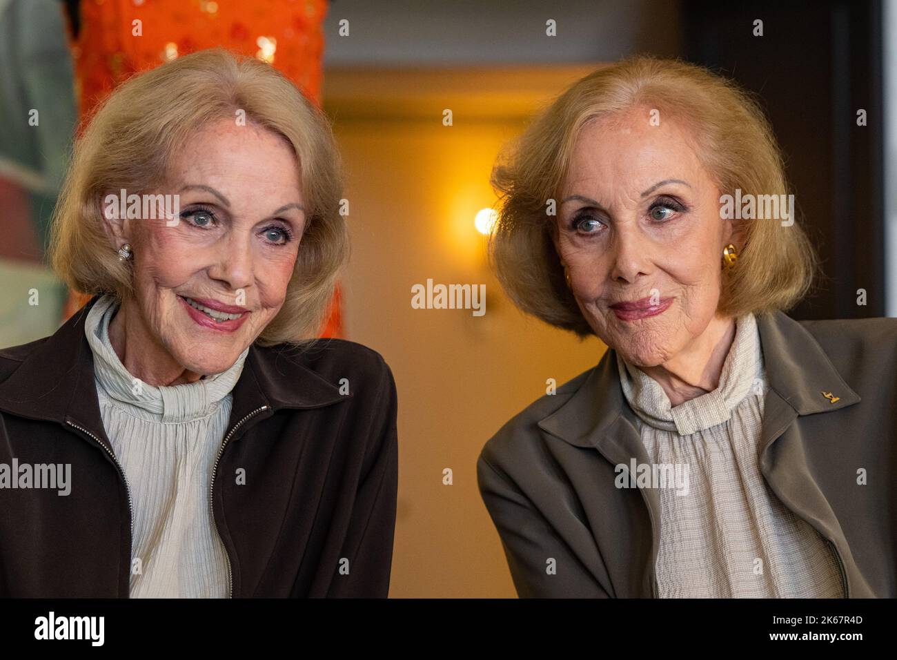 Munich, Germany. 12th Oct, 2022. The Kessler twins, Alice (r.) and ...