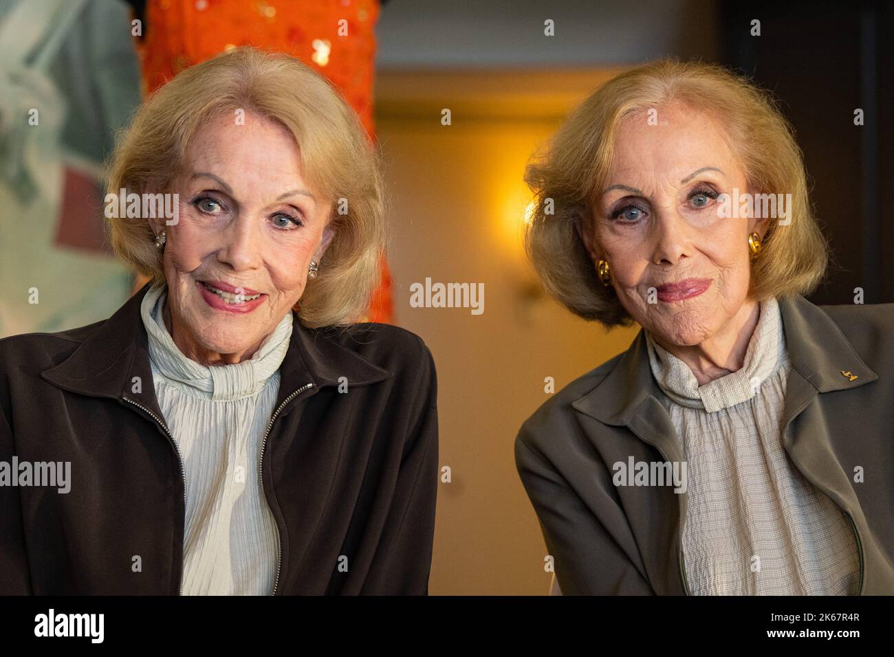 Munich, Germany. 12th Oct, 2022. The Kessler twins, Alice (r.) and ...