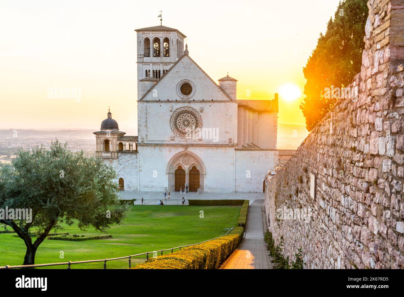 Basilica San Francesco Assisi at sunset time Stock Photo - Alamy