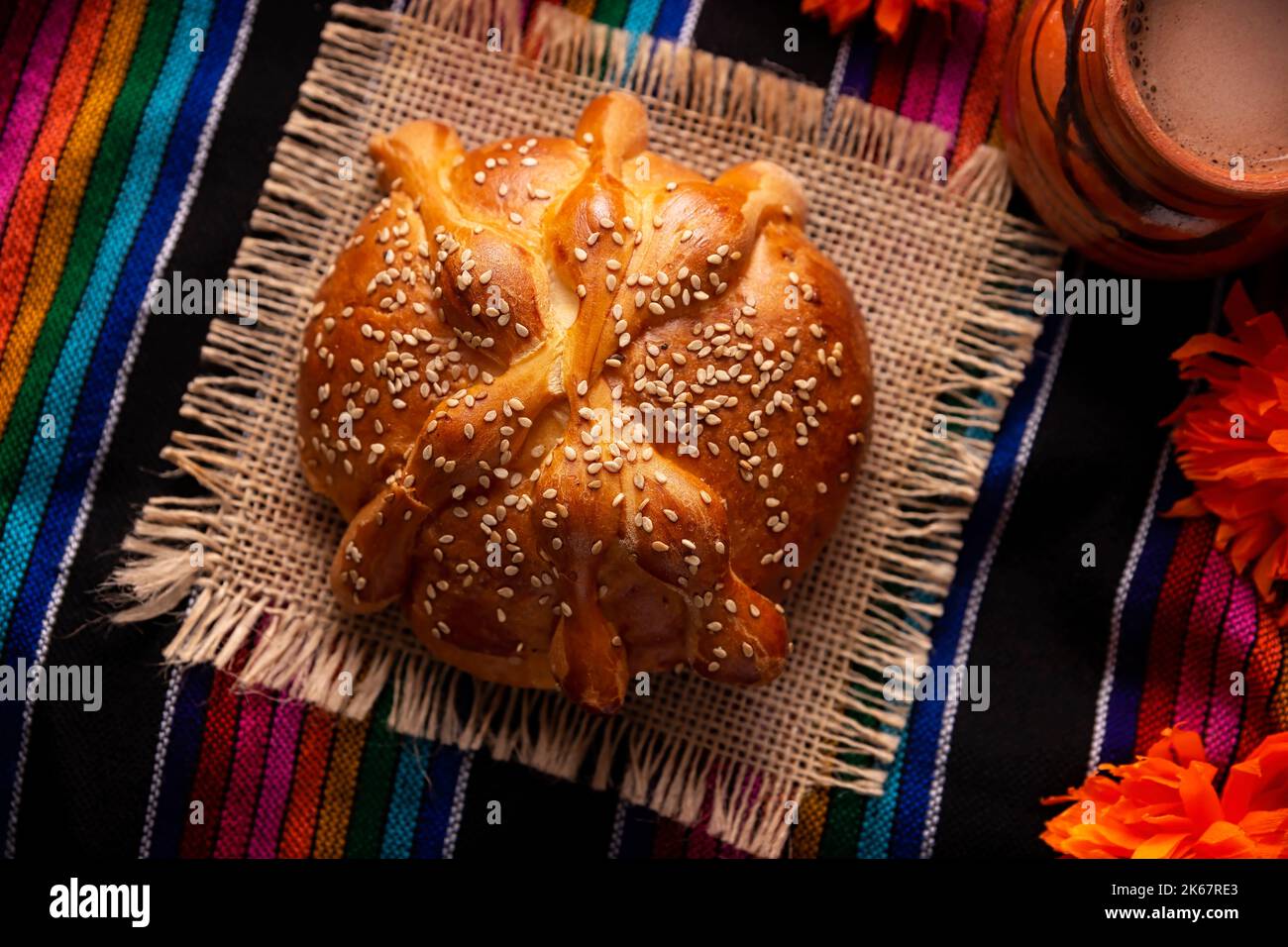 Pan de Muerto. Typical Mexican sweet bread with sesame seeds, that is ...