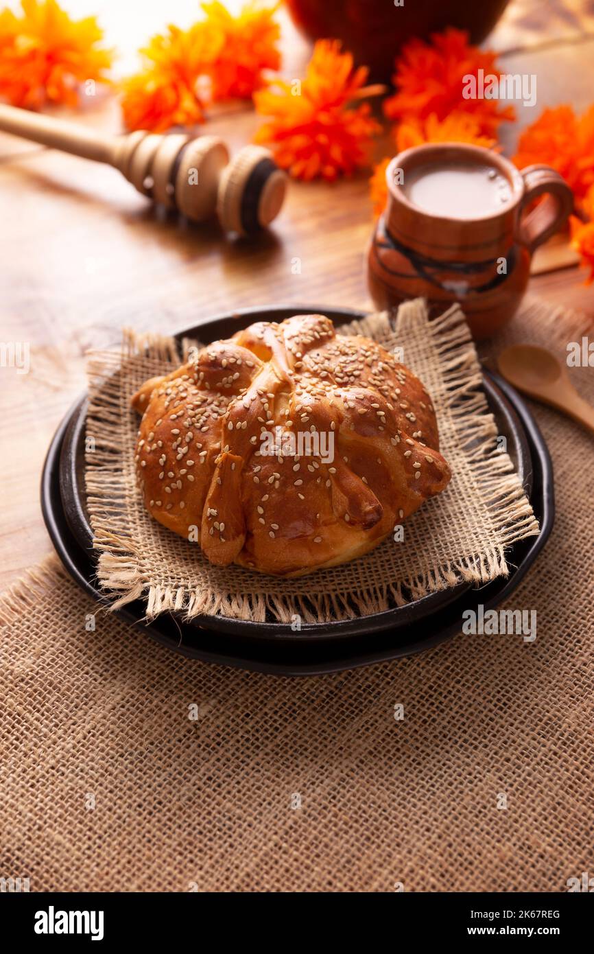 Pan de Muerto. Typical Mexican sweet bread with sesame seeds, that is ...