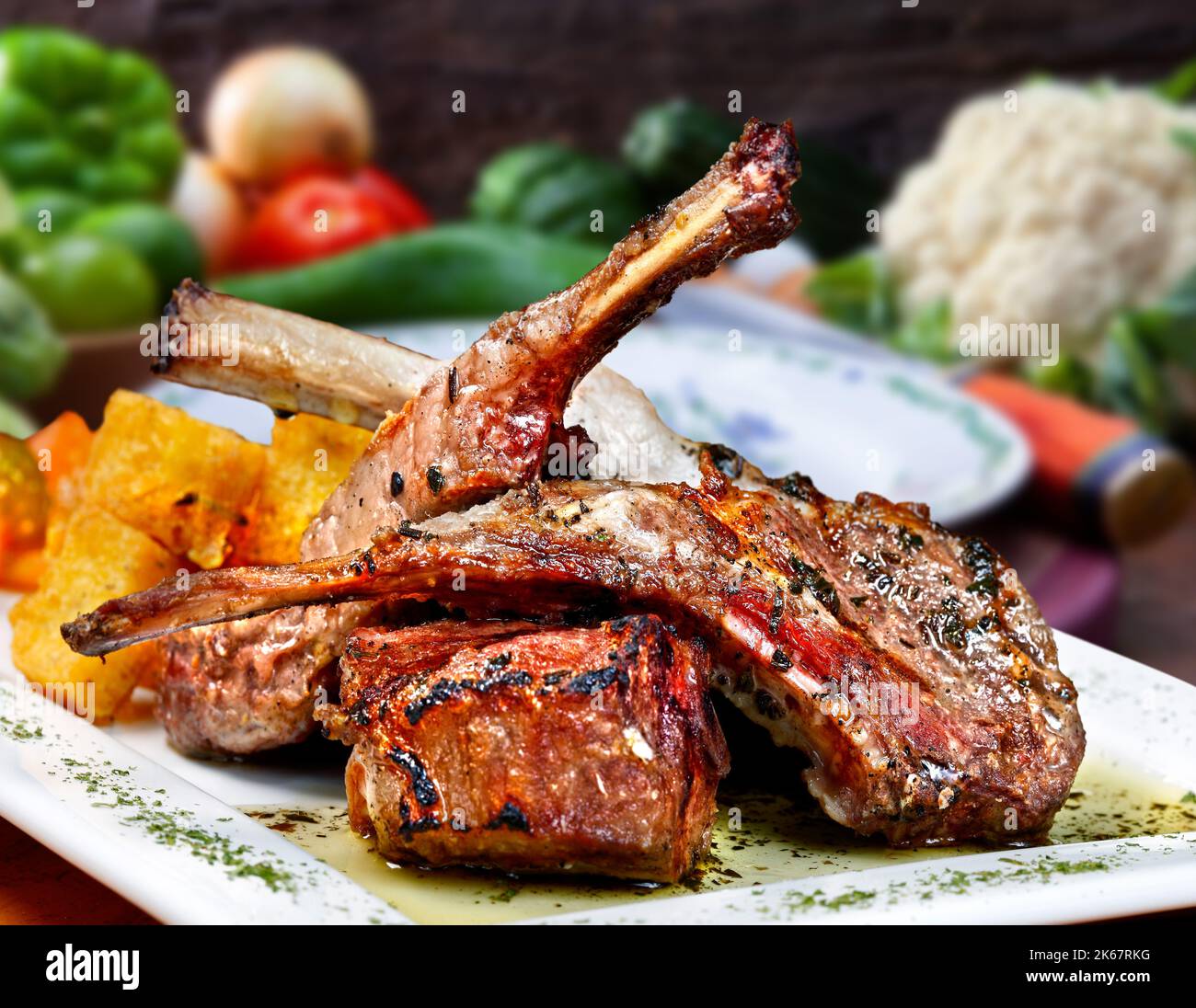 Roasted lamb chops with olive oil and herbs Stock Photo - Alamy