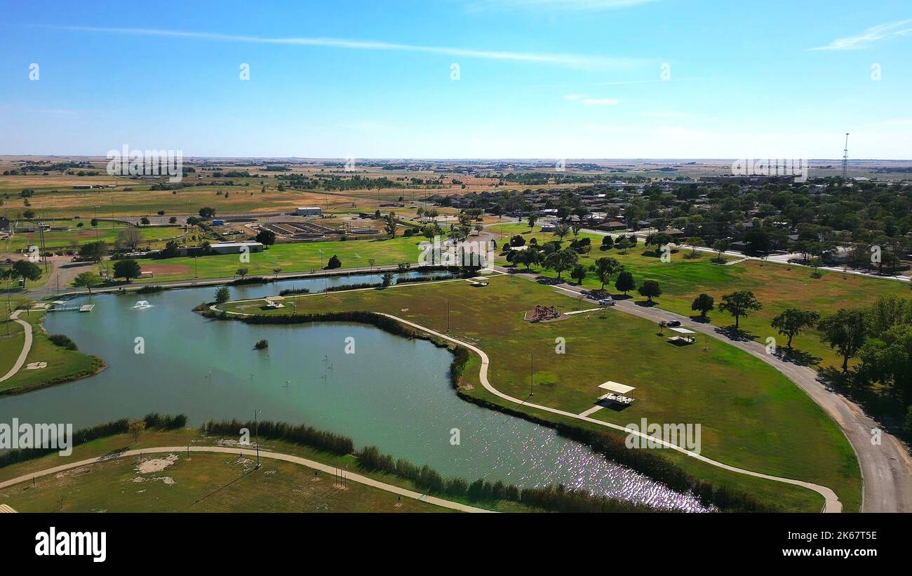An aerial view of the Southeast Canyon park with green trees and ...