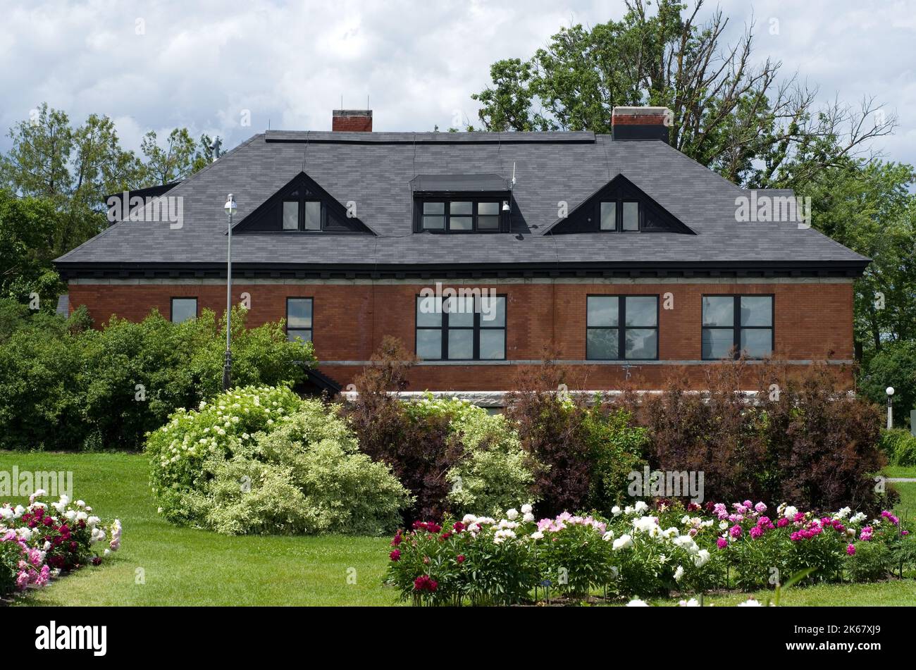 Experimental Farm Brick Building with Flowers in Ottawa Ontario Canada ...