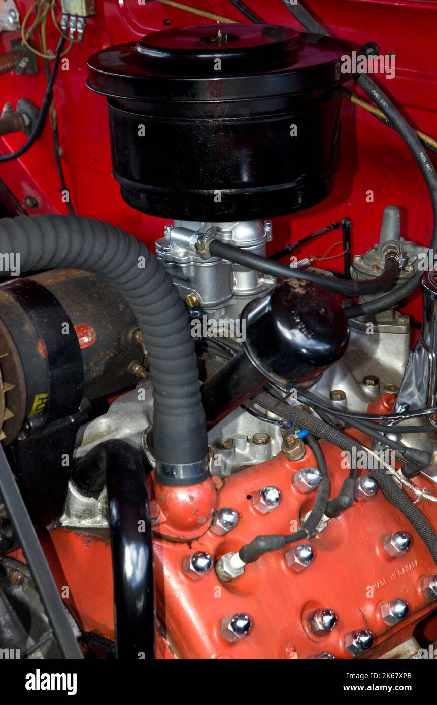 Old Restored Orange Flat Head V8 Engine Vertical Stock Photo - Alamy