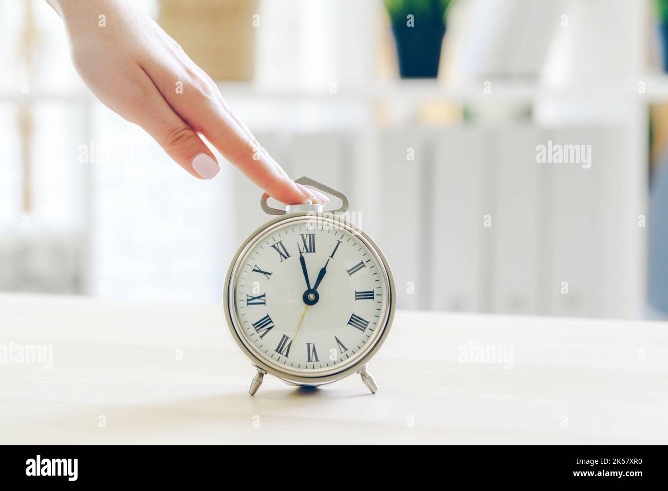 Man alarm clock switch off hi-res stock photography and images - Alamy