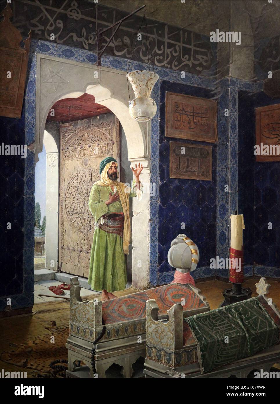 Old man in front of children's graves / Vieil homme devant des tombeaux ...