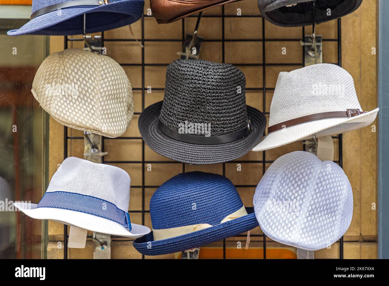 New Hats Caps Classic Fedora Summer Headgear at Shelf Stock Photo - Alamy