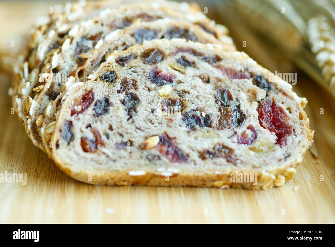raisin whole grain baked bread on table Stock Photo - Alamy