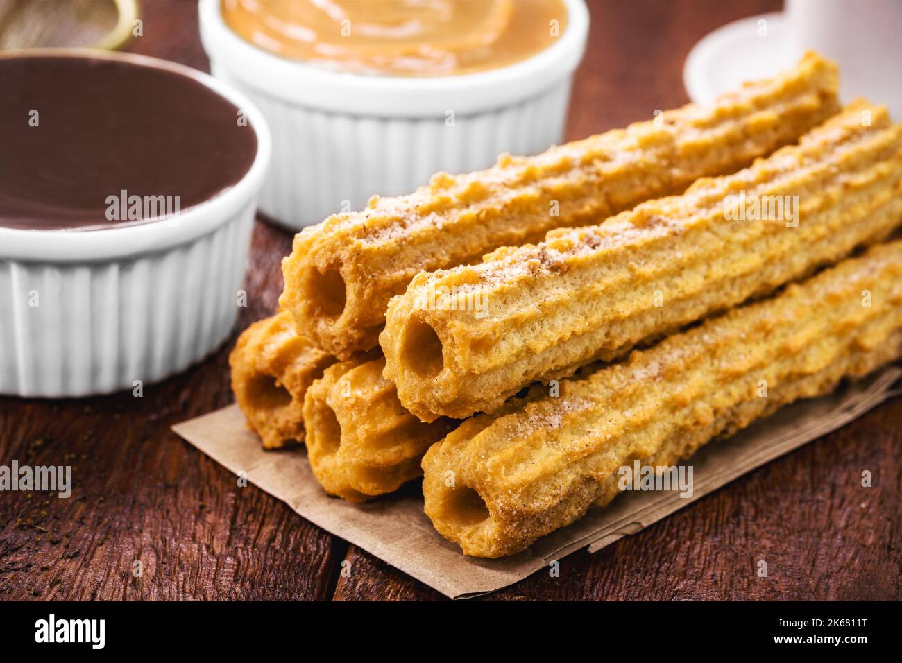 churros, fried sweet with granulated sugar, filled with dulce de leche ...