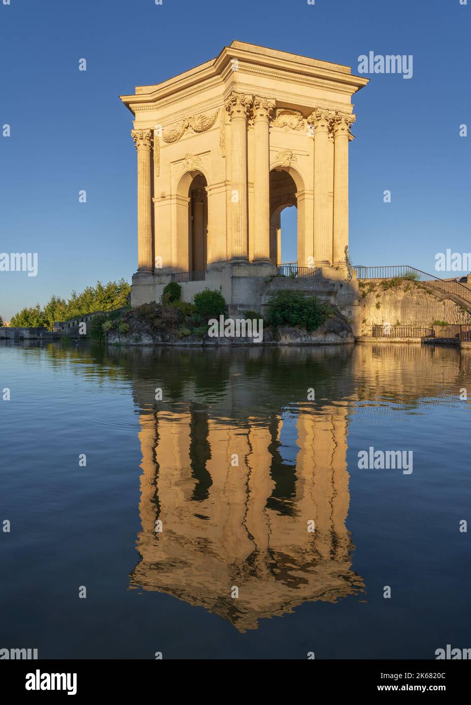 Morning view of historic ancient water tower stone building with ...